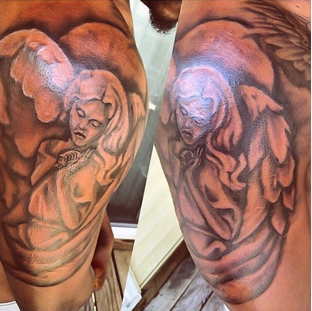 Sean Tizzle goes 'Angelic' with 3rd tattoo in 6 months