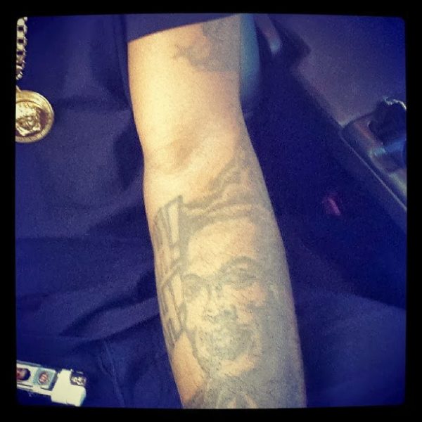 See 12 Of Burna Boy's Tattoos Perfectly Explained By Him